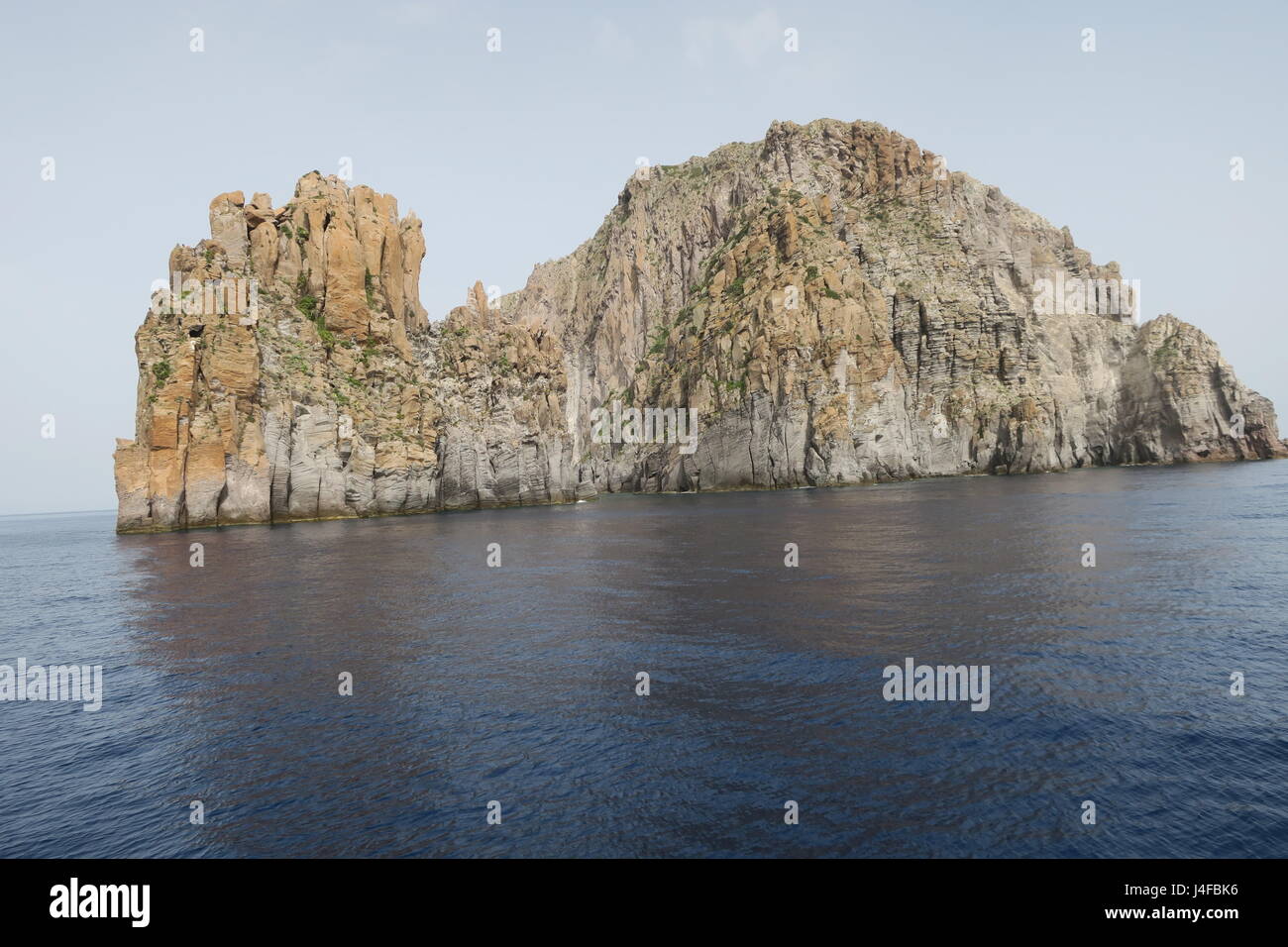 There's an interesting mighty rock in a sea near Panarea island on ...