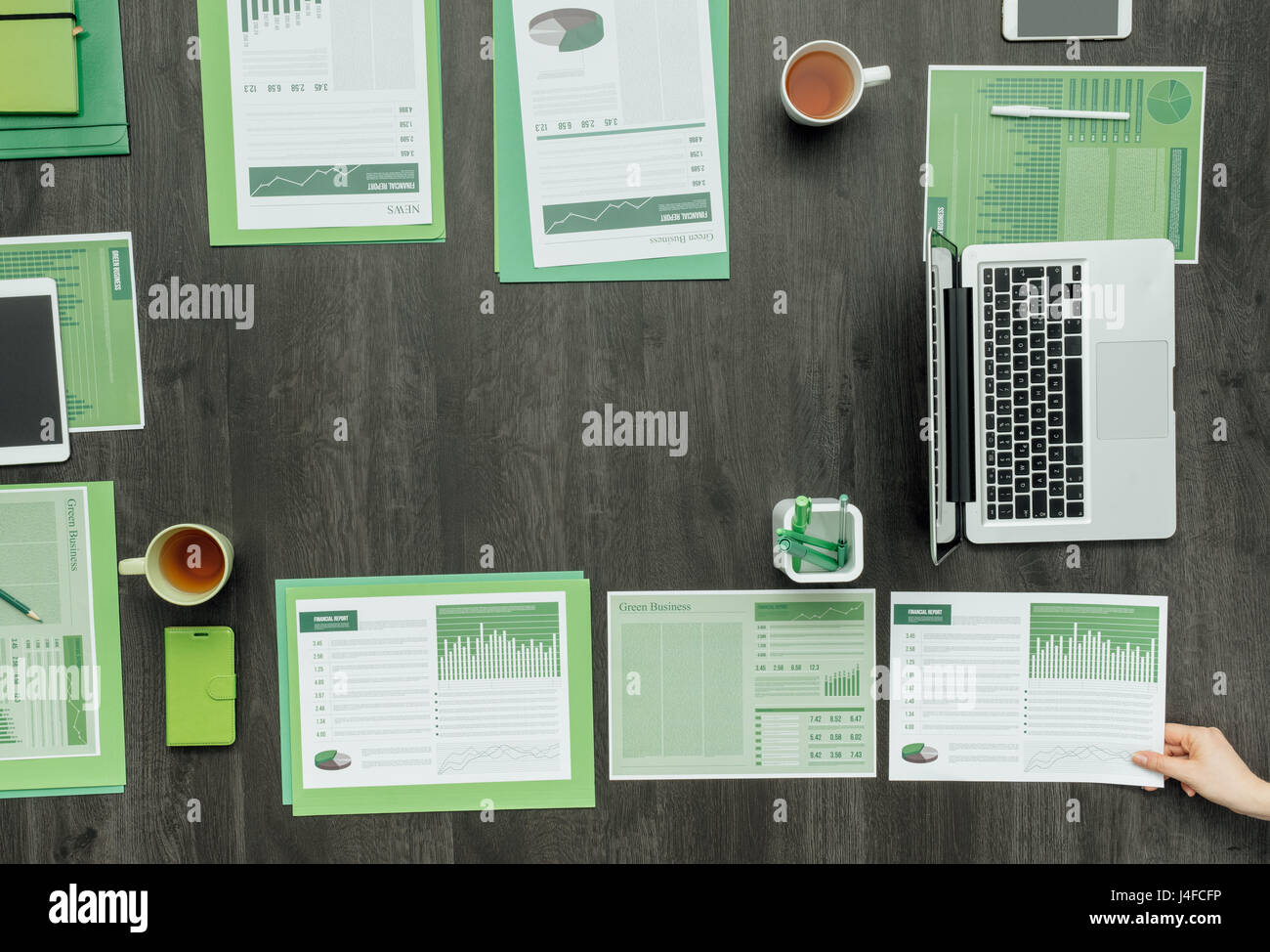 Eco business and ecology green office desktop with laptops and touch ...
