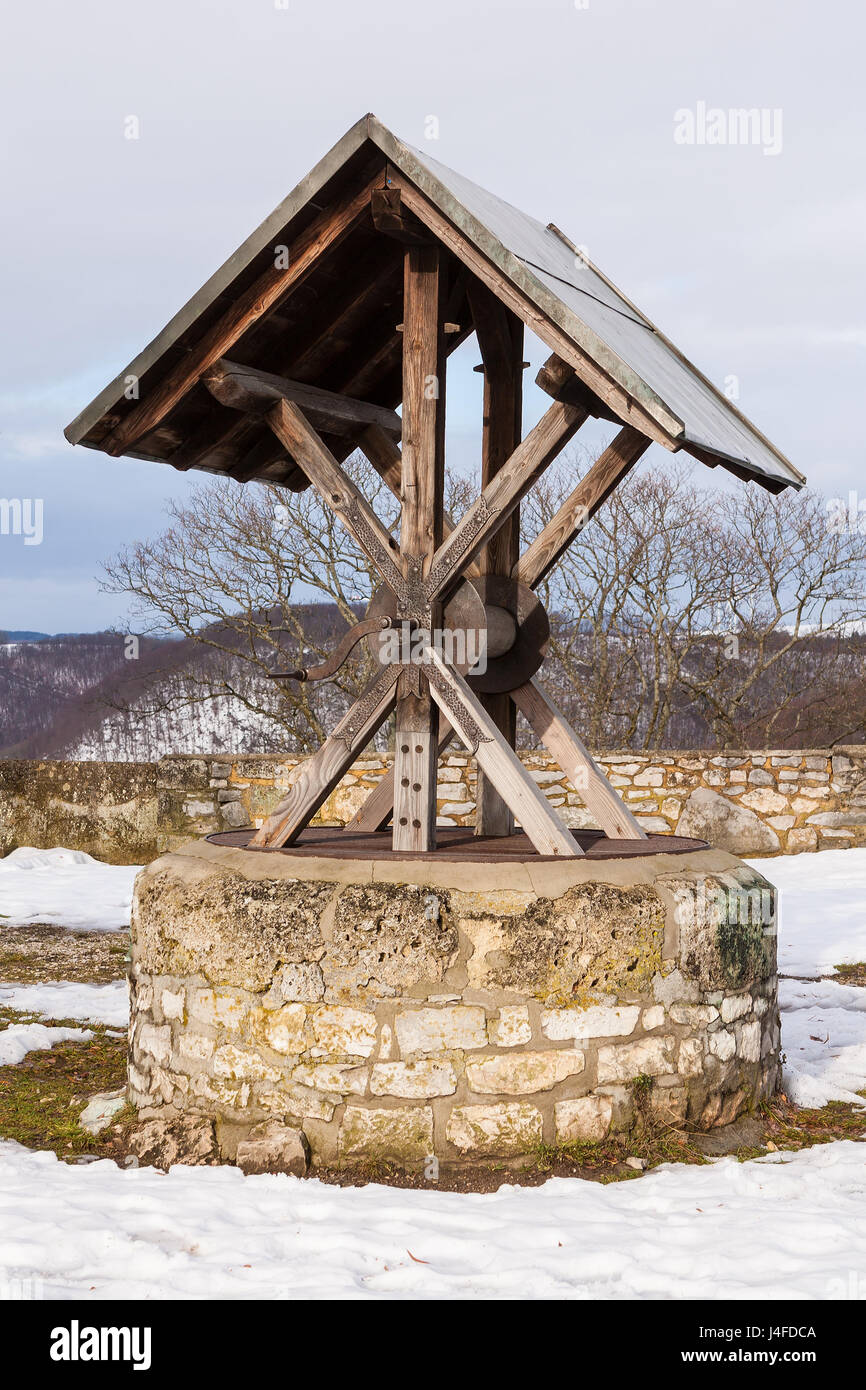 Old draw-well in the snow Stock Photo - Alamy