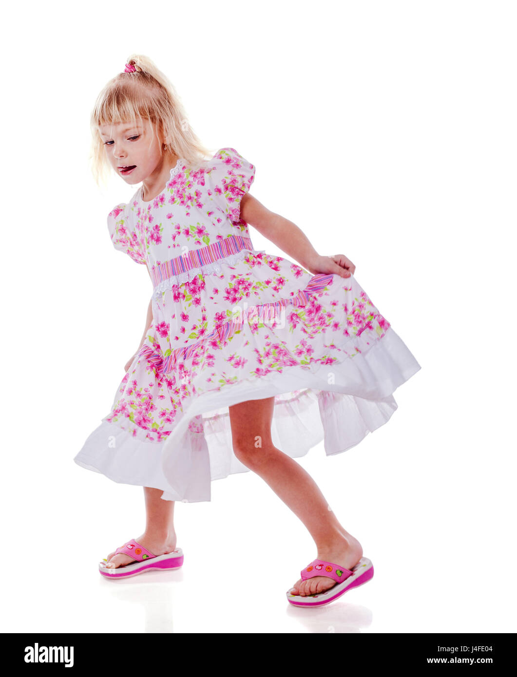 Cheerful girl wearing pretty dress isolated on white Stock Photo - Alamy