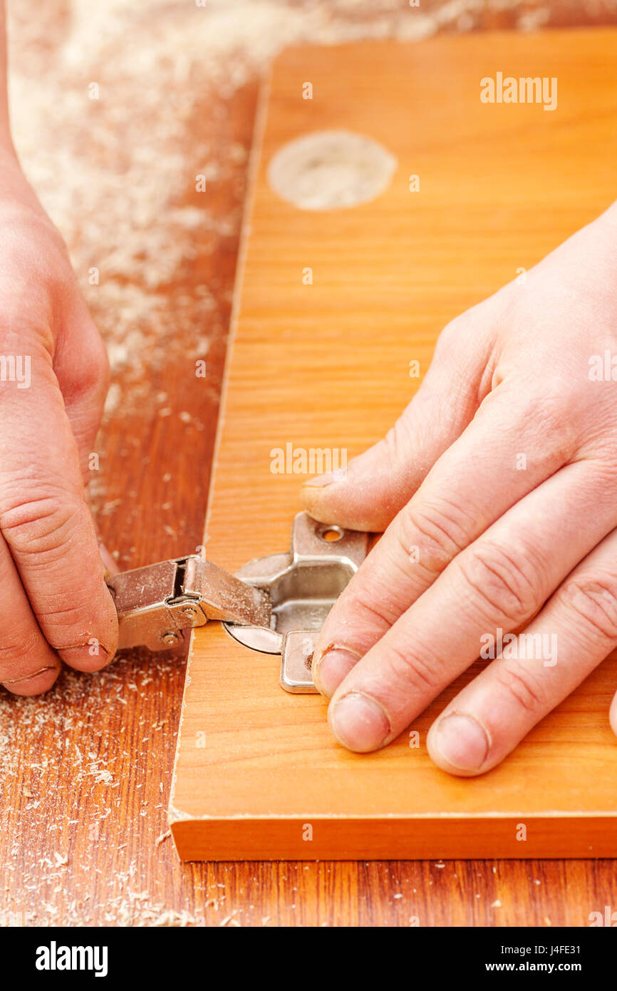 Hinge installation hi-res stock photography and images - Alamy