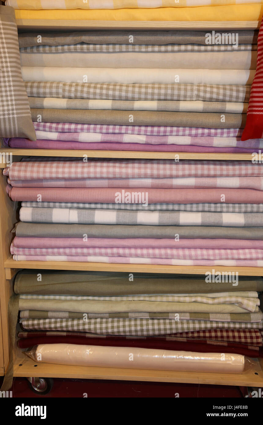 Inside the fabric store with many textile products for sale Stock Photo ...