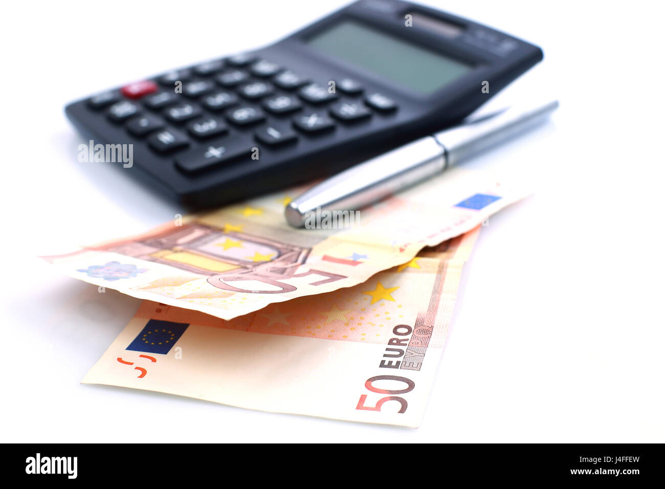 Euro Notes with Calculator on the white background Stock Photo - Alamy