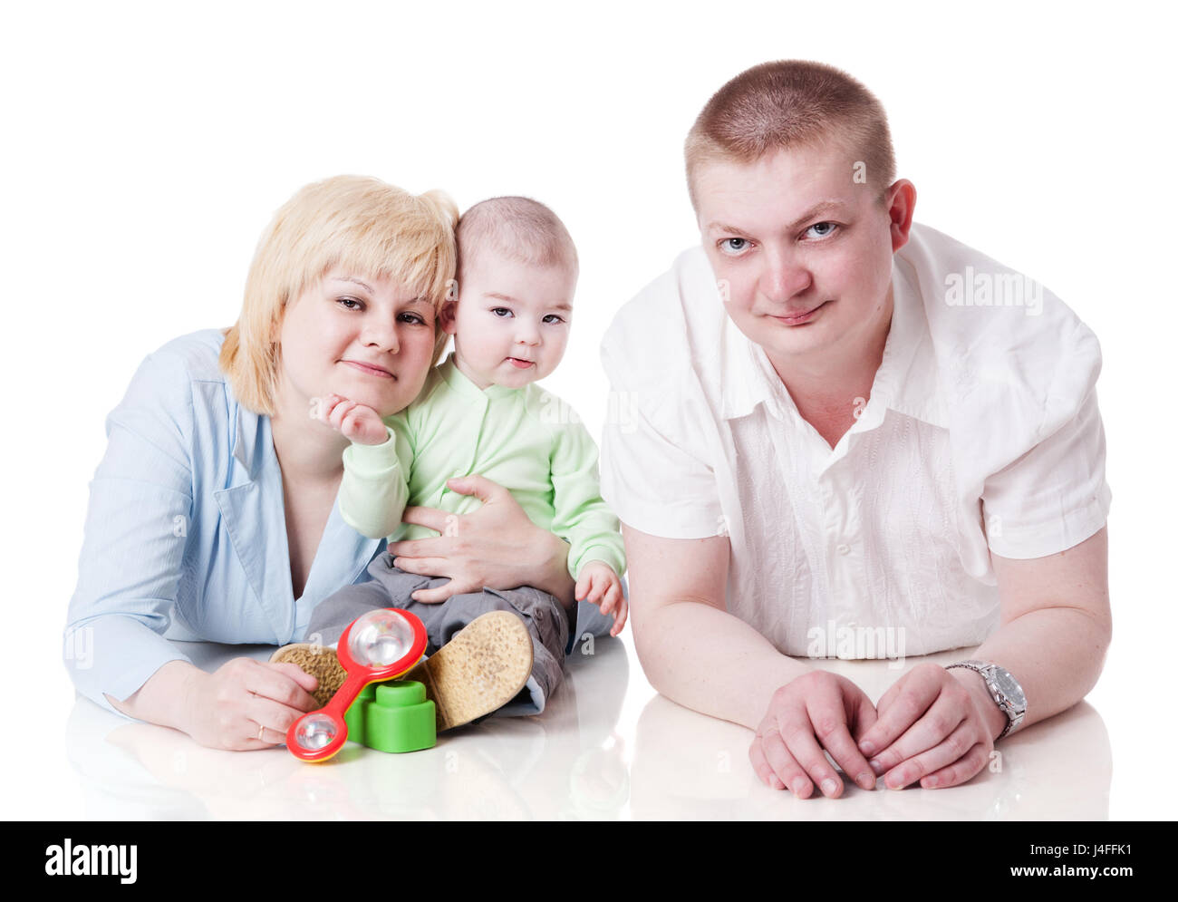 Happy Family of mother father and one year baby isolated Stock Photo ...