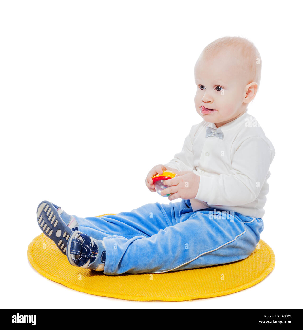 boy playing with blue toy isolated on white Stock Photo - Alamy