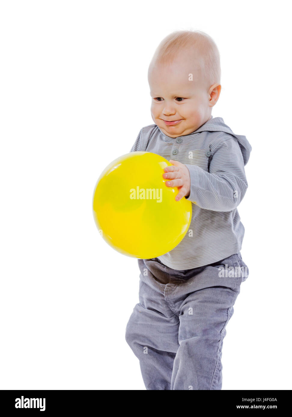Toddler boy playing with balloon isolated on white Stock Photo - Alamy