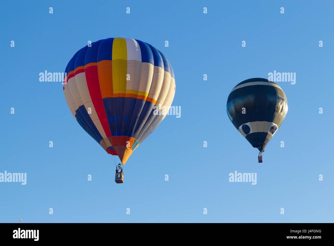 Two colored hot air balloons hi-res stock photography and images - Alamy