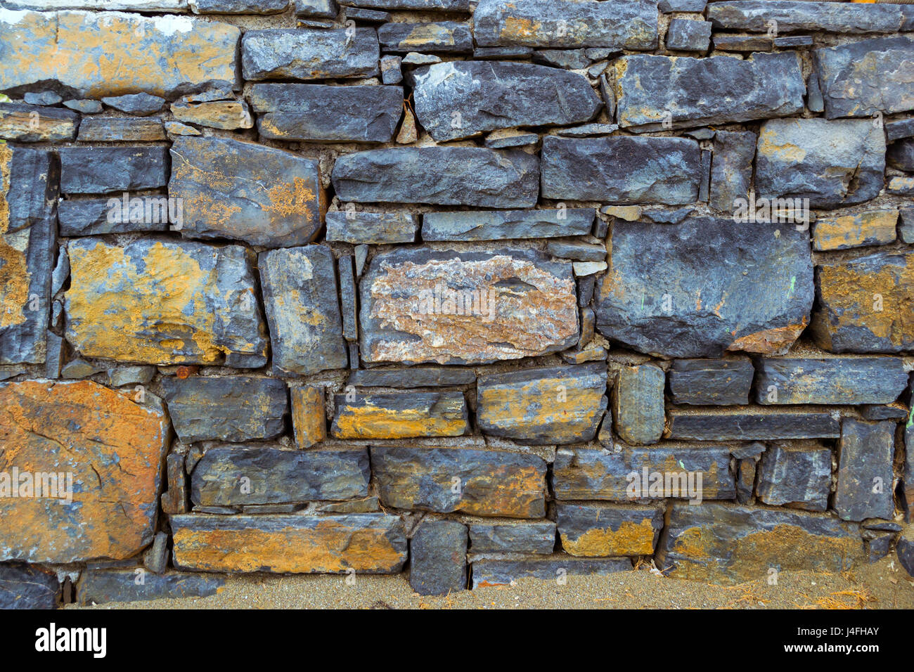 Stone texture of granite wall for creative background. Dark monolithic ...