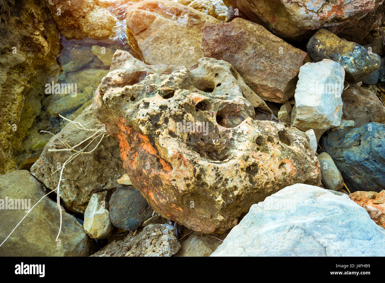 Texture of Marine spit on beach, Bali, Crete of huge rocks going out to ...