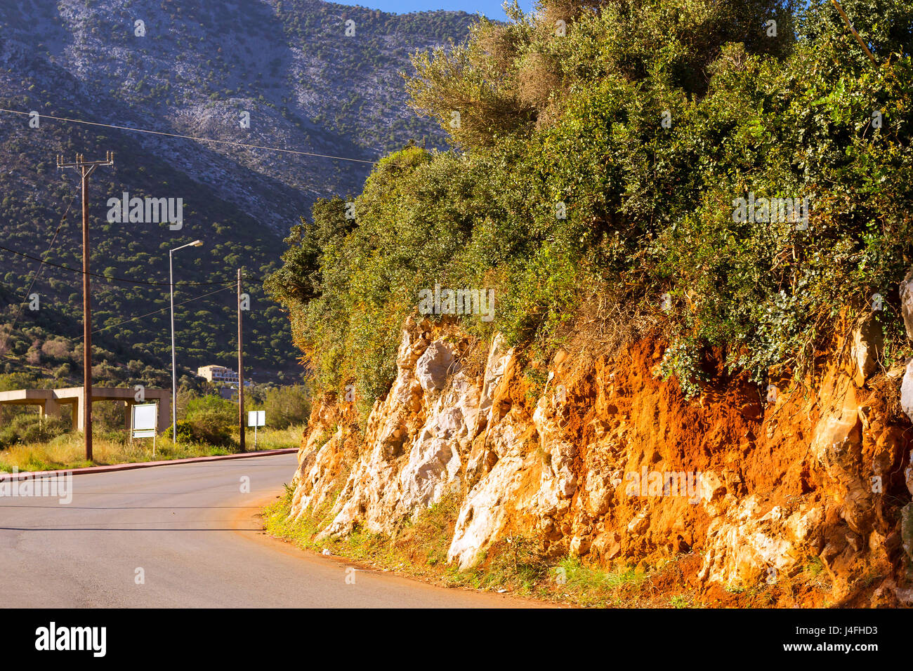 Mountain road, cut through rock. Slice mountain shale, texture of stone ...