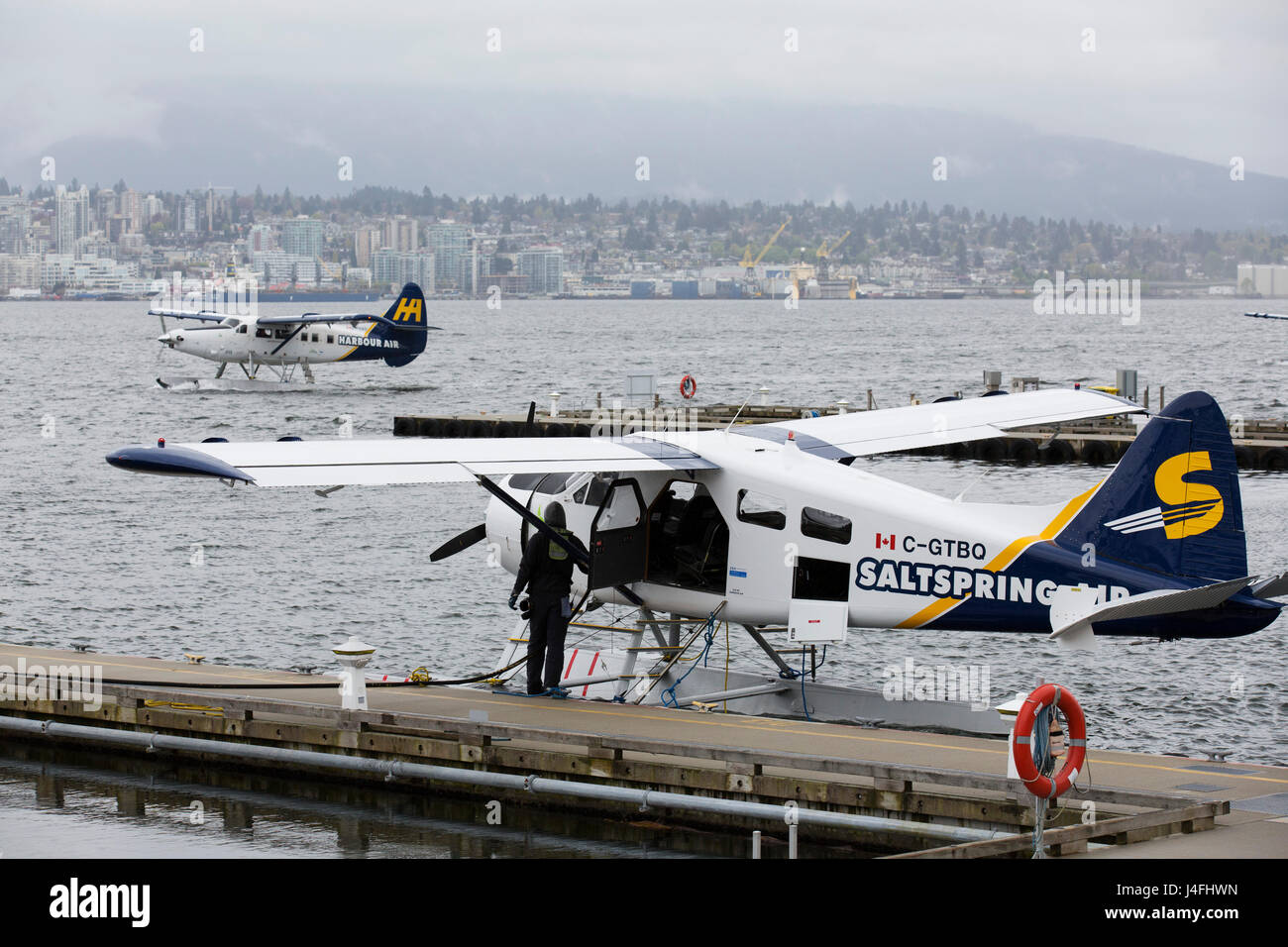 A Saltspring Air float plane in Vancouver, Canada. Planes land and take ...