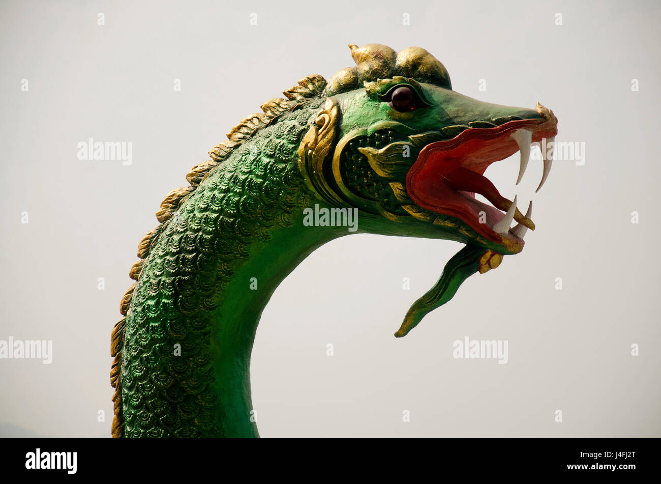 Green naga statue for people take photo at Mae khong riverside at ...