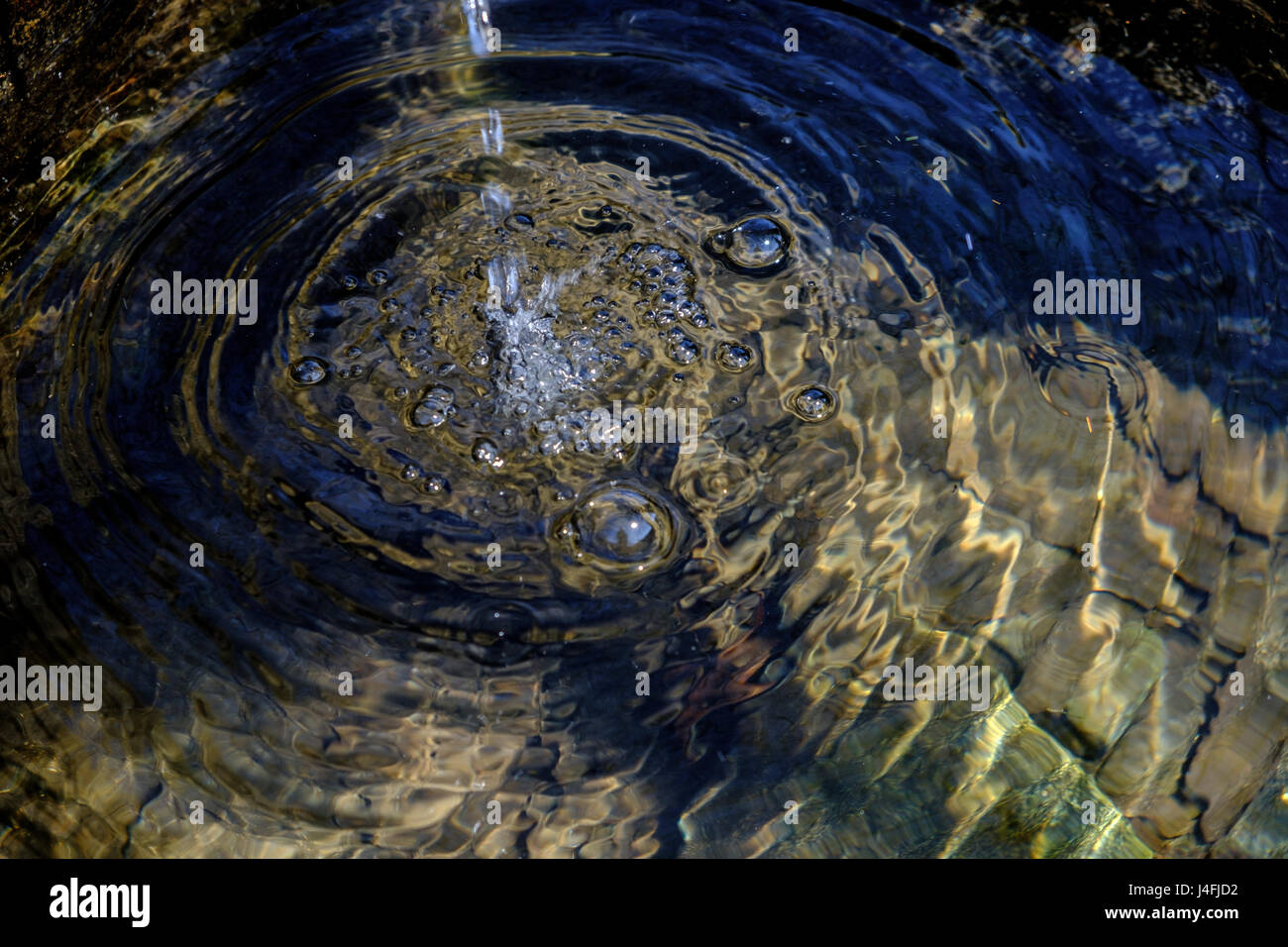 water dripping in a fountain Stock Photo - Alamy