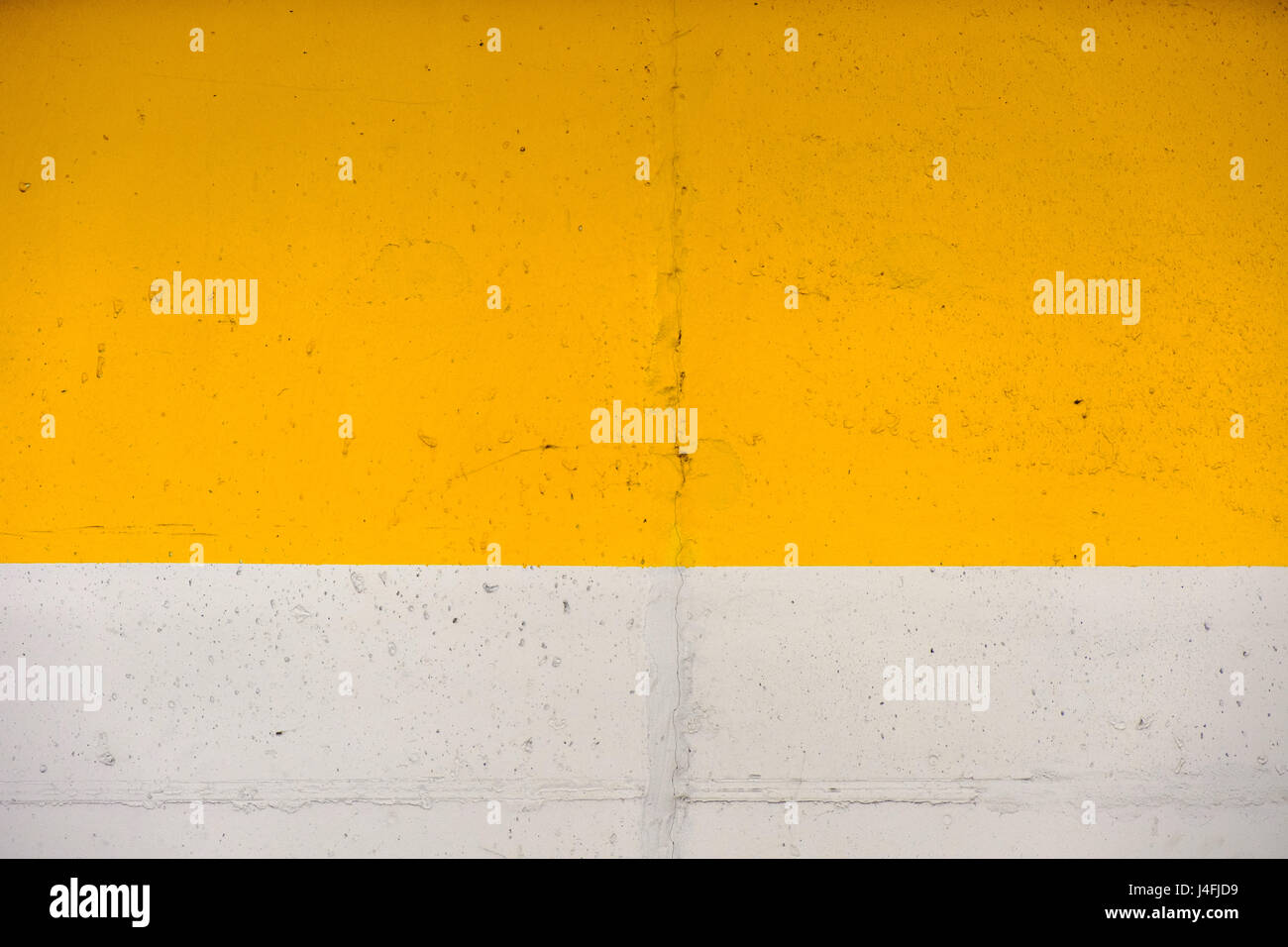 Yellow and grey painted wall Stock Photo - Alamy