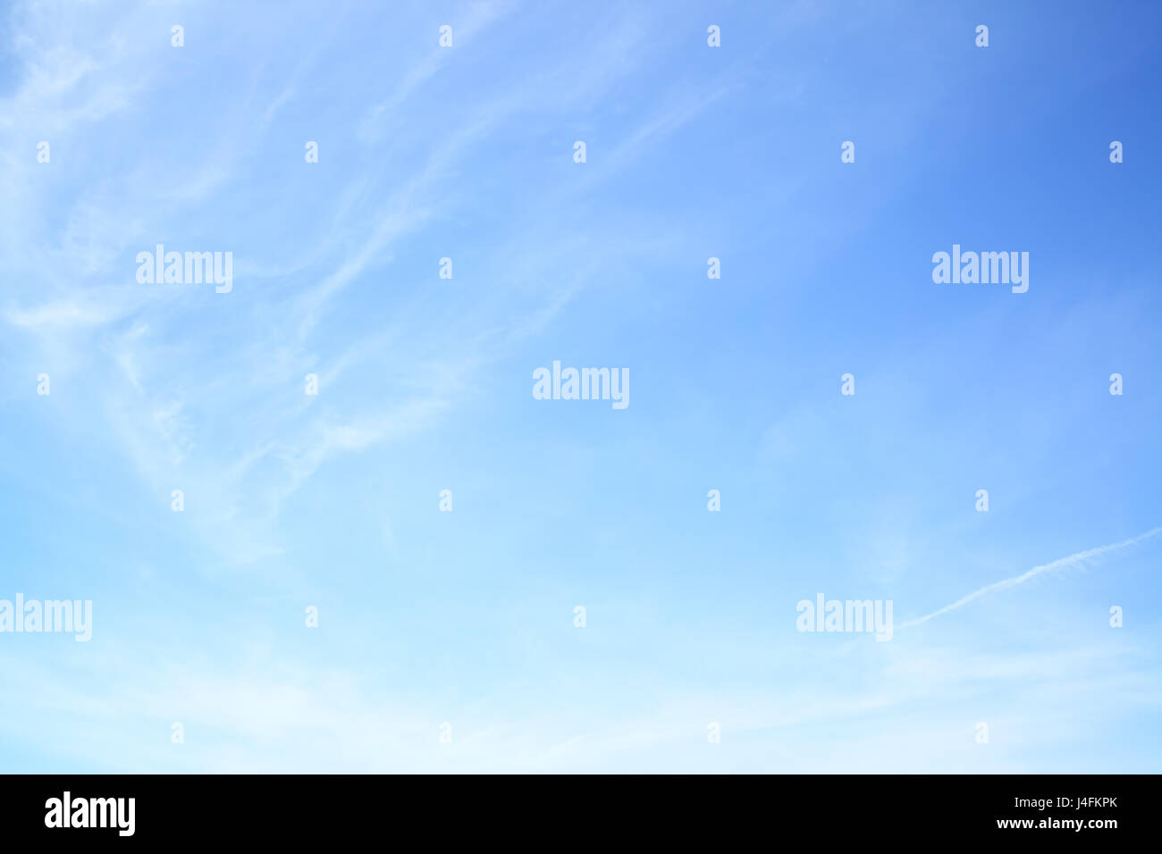 Blue spring sky with light clouds - natural background Stock Photo - Alamy