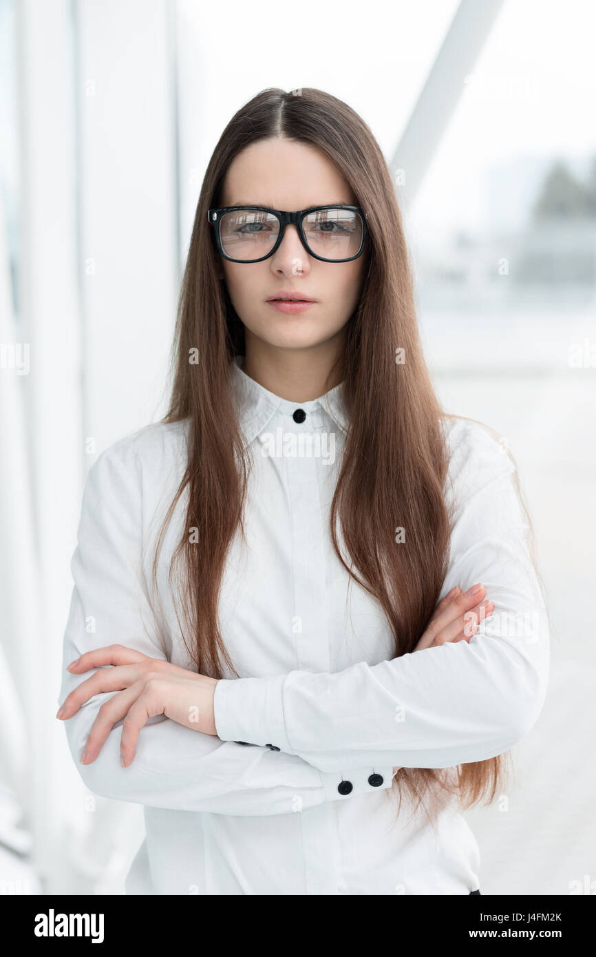 Young female manager portrait. Confident Business woman in glasses ...