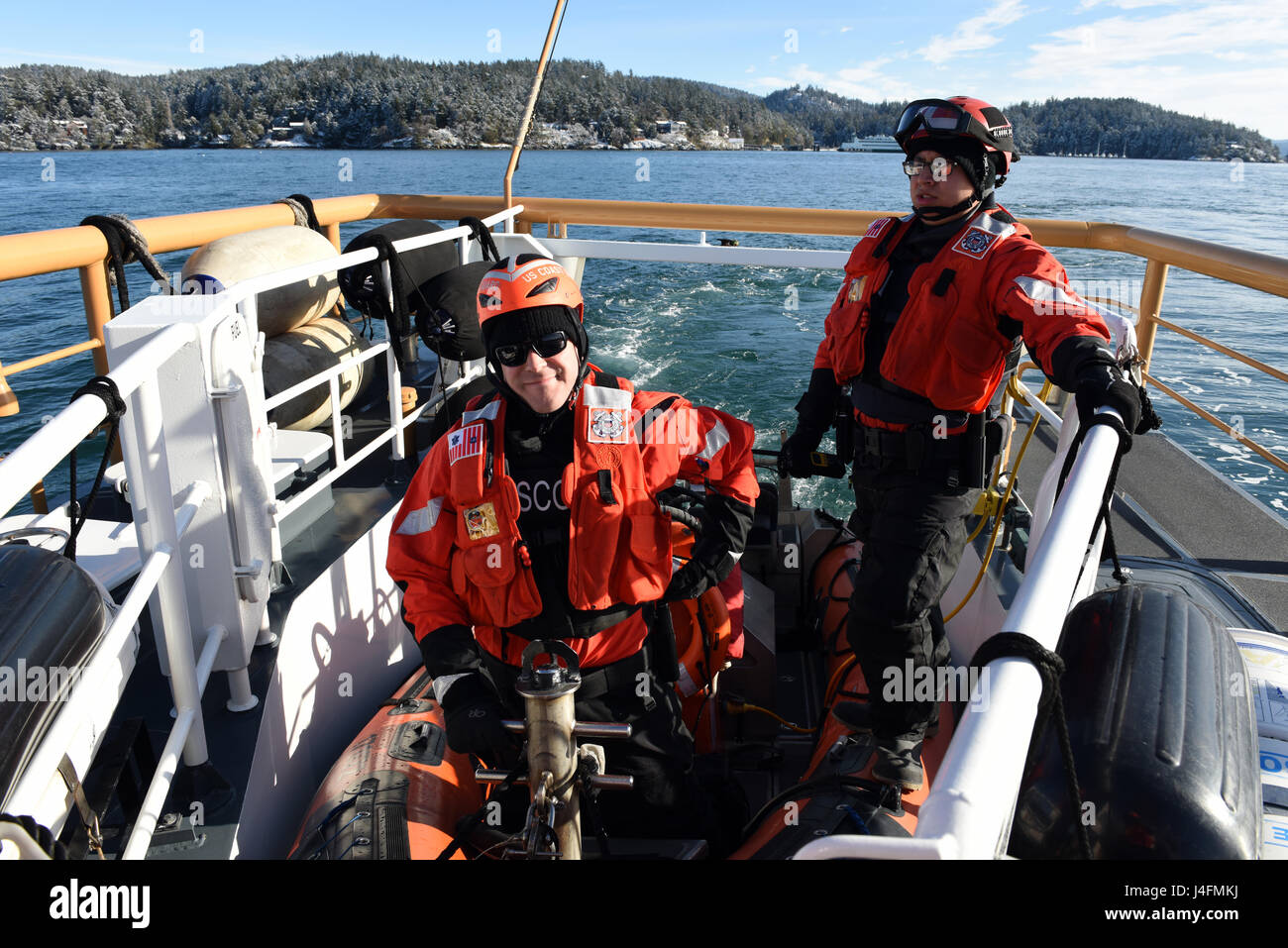 A Coast Guard Cutter Swordfish crewmembers prepare to launch aboard a ...