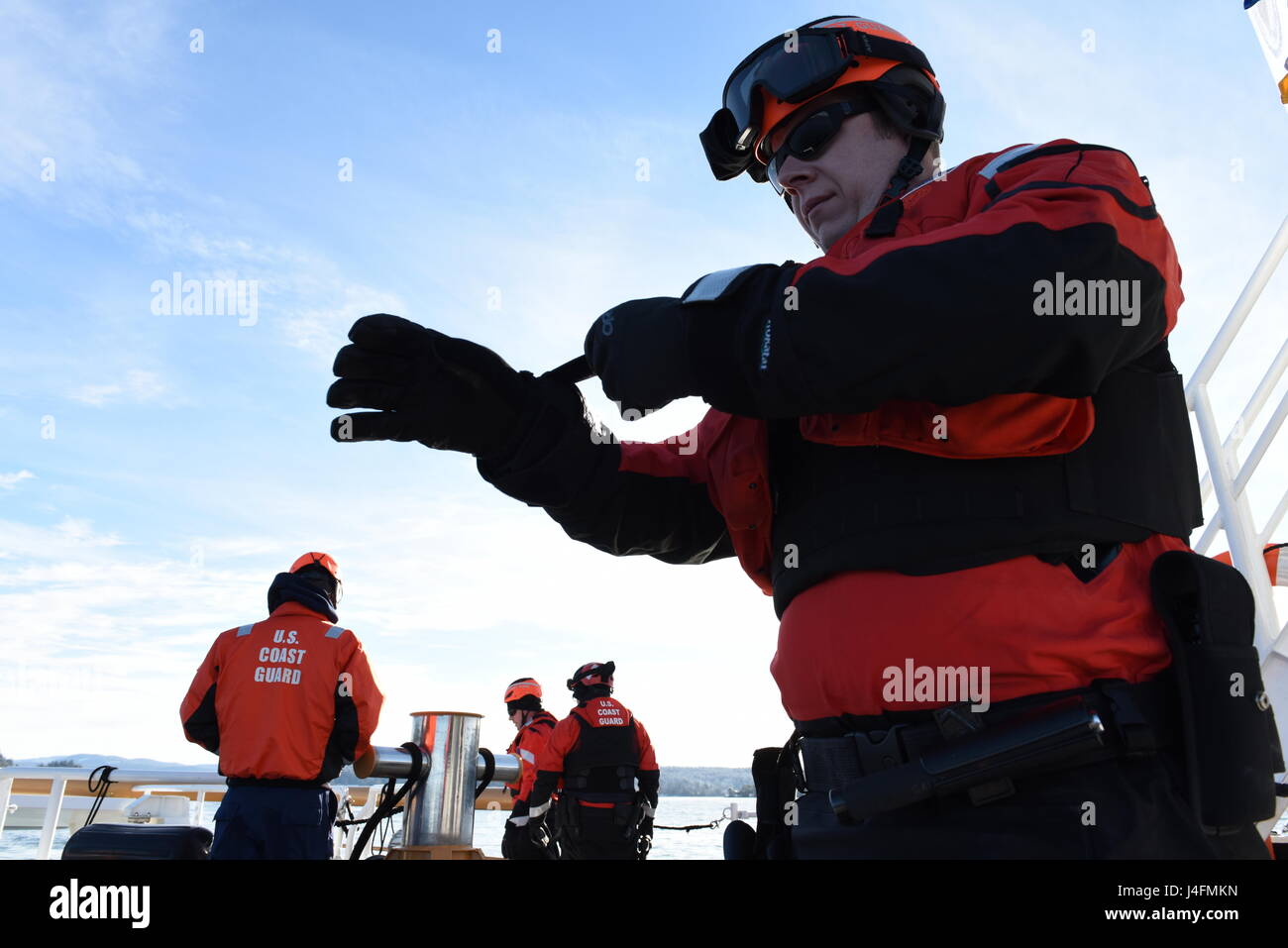 A Coast Guard Cutter Swordfish crewmember prepares to launch aboard a ...