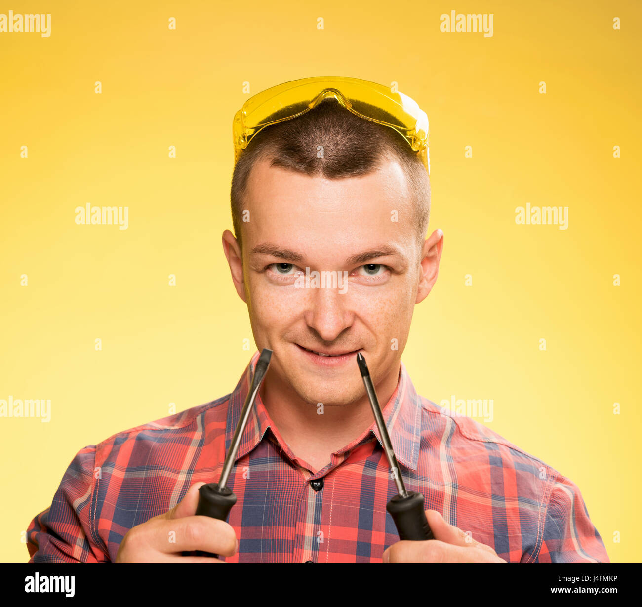 man with a screwdriver Stock Photo - Alamy