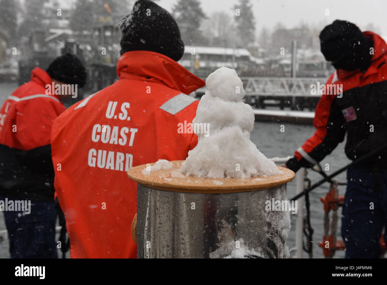 A small snowman hitches a ride aboard the Coast Guard Cutter Swordfish ...