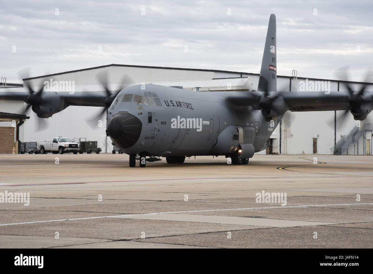 An aircrew from the 53rd Weather Reconnaissance Squadron taxis for a ...
