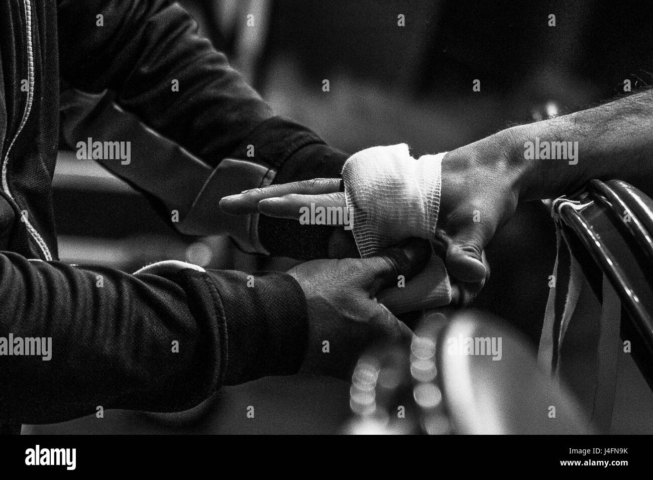 A boxer has his hands wrapped during a boxing tournament at Fort Bliss ...