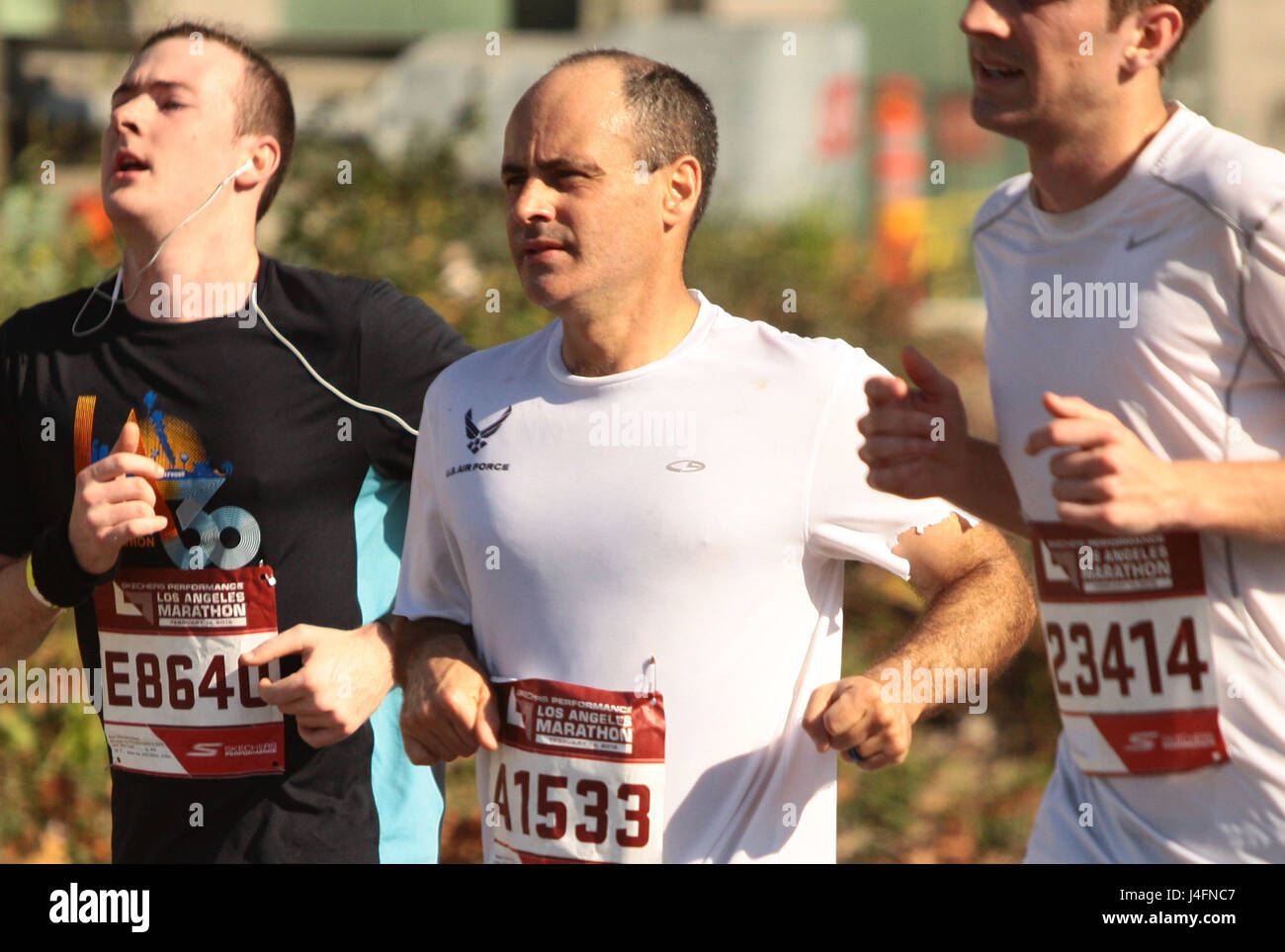 Miguel Anguiano runs the nineteenth mile of the 31st annual Los Angeles ...