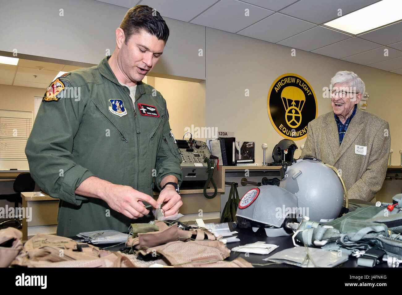 Major Bill Rundell, a pilot with the 107th Fighter Squadron, shows some ...