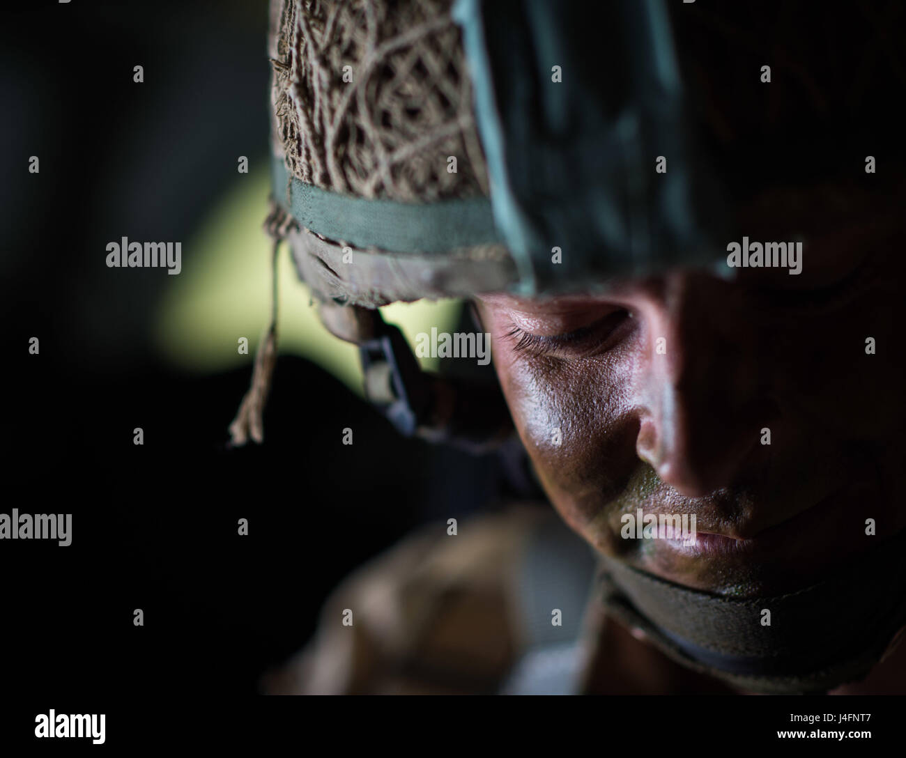A British army parachute regiment paratrooper prepares to conduct a ...