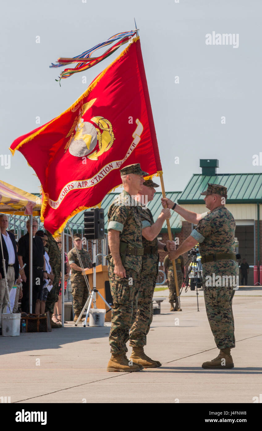 U.S. Marine Corps Col. Russell C. Burton (center), commanding officer ...
