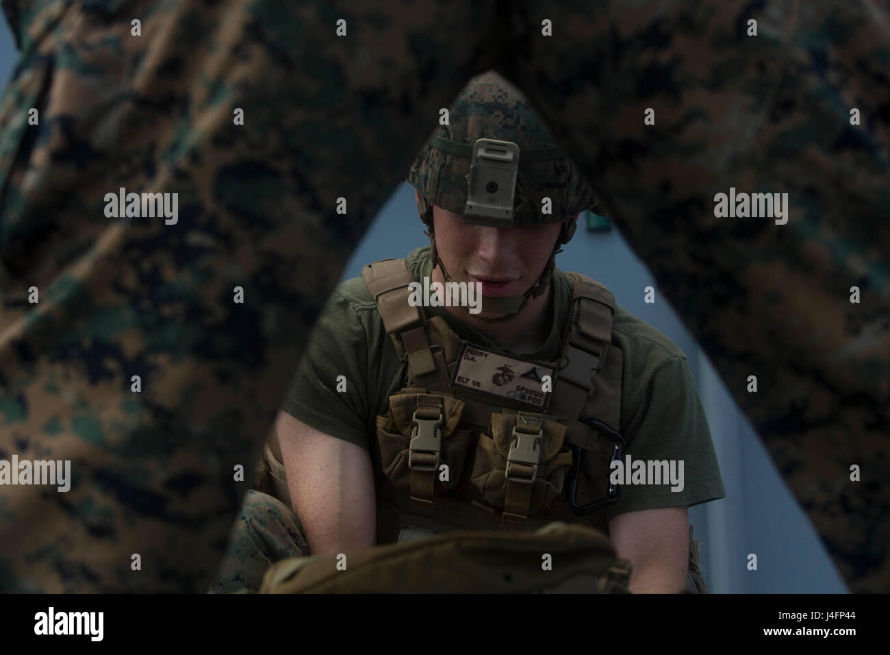 U.S. Marine Corps Lance Cpl. Damian A. Perry, a mortarman assigned to ...