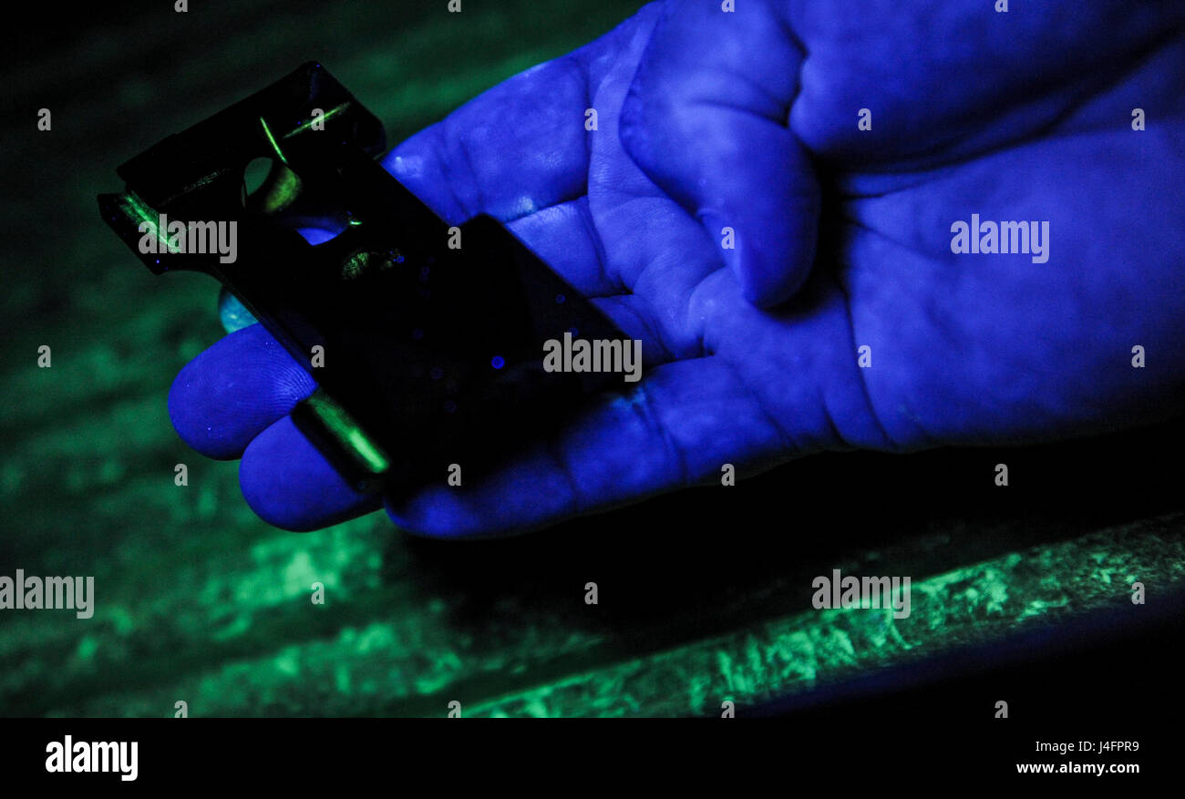 The NDI lab at Nellis Air Force Base uses fluorescent magnetic particle ...