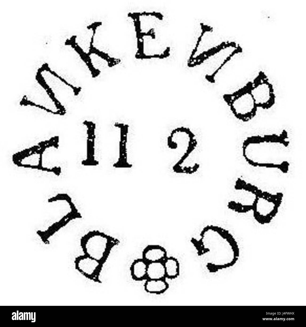 This object is a round stamp form, typically used for creating ...