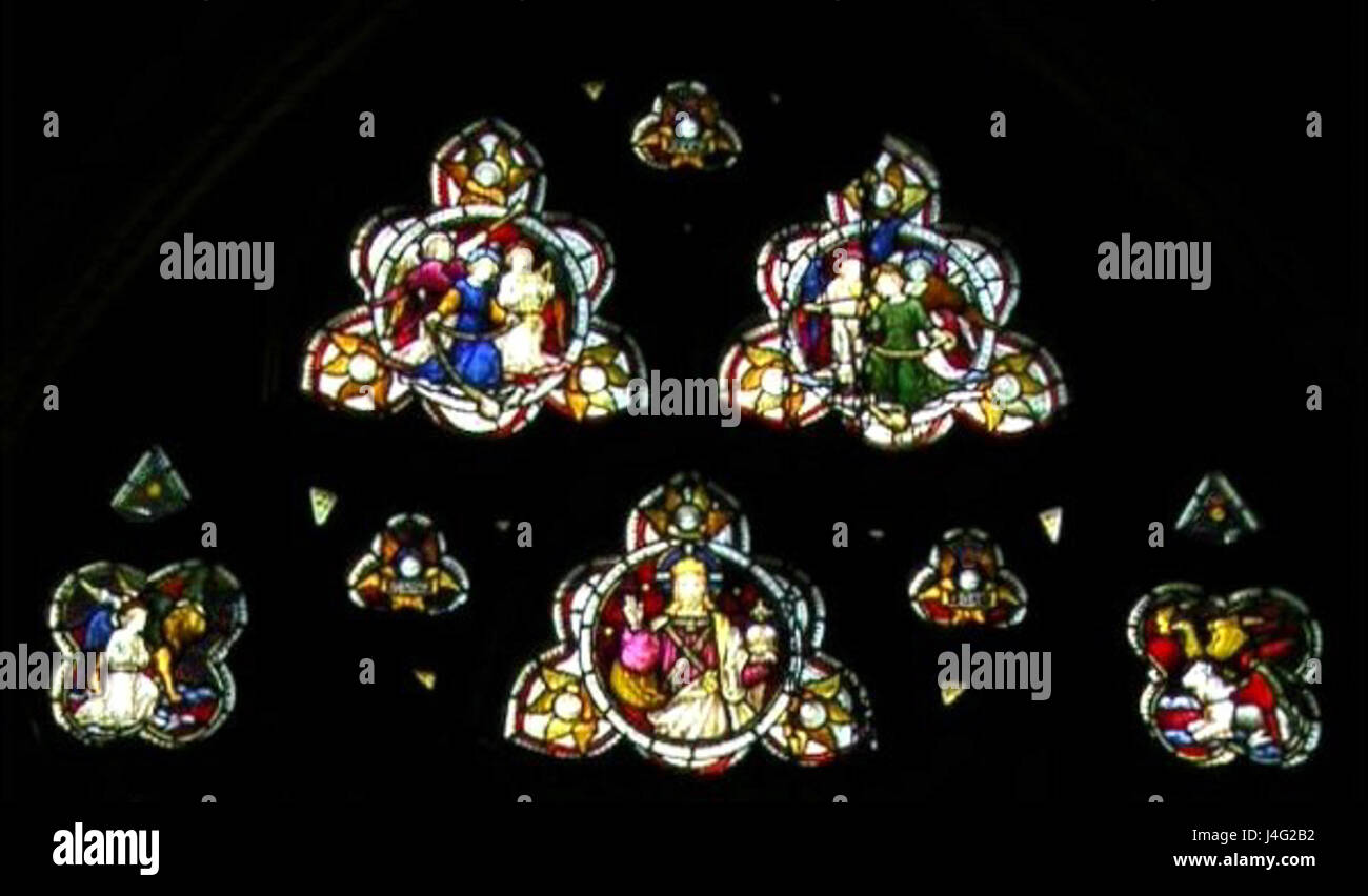 The St. Peter Burnham Tracery refers to the intricate window design at ...