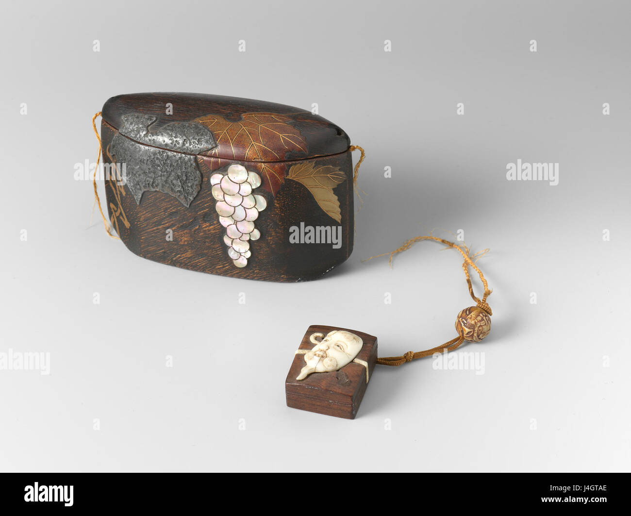 This tobacco box, identified as AK MAK 516, is part of the collection ...