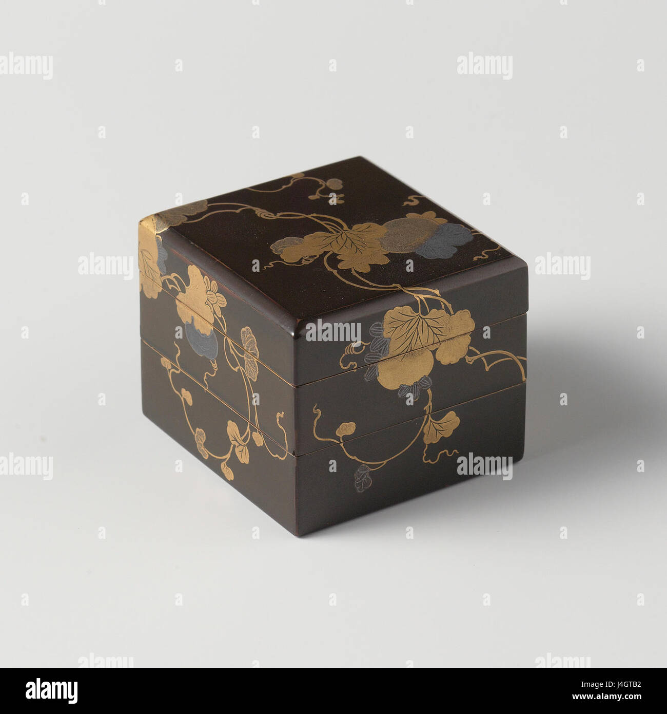 A Japanese stapeldoos (stacking box) featuring black lacquer with ...