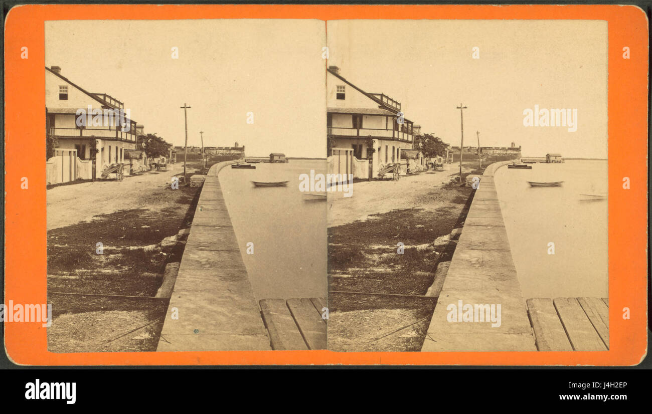 The 'Sea Wall, looking north' photograph captures a view of a sea wall ...