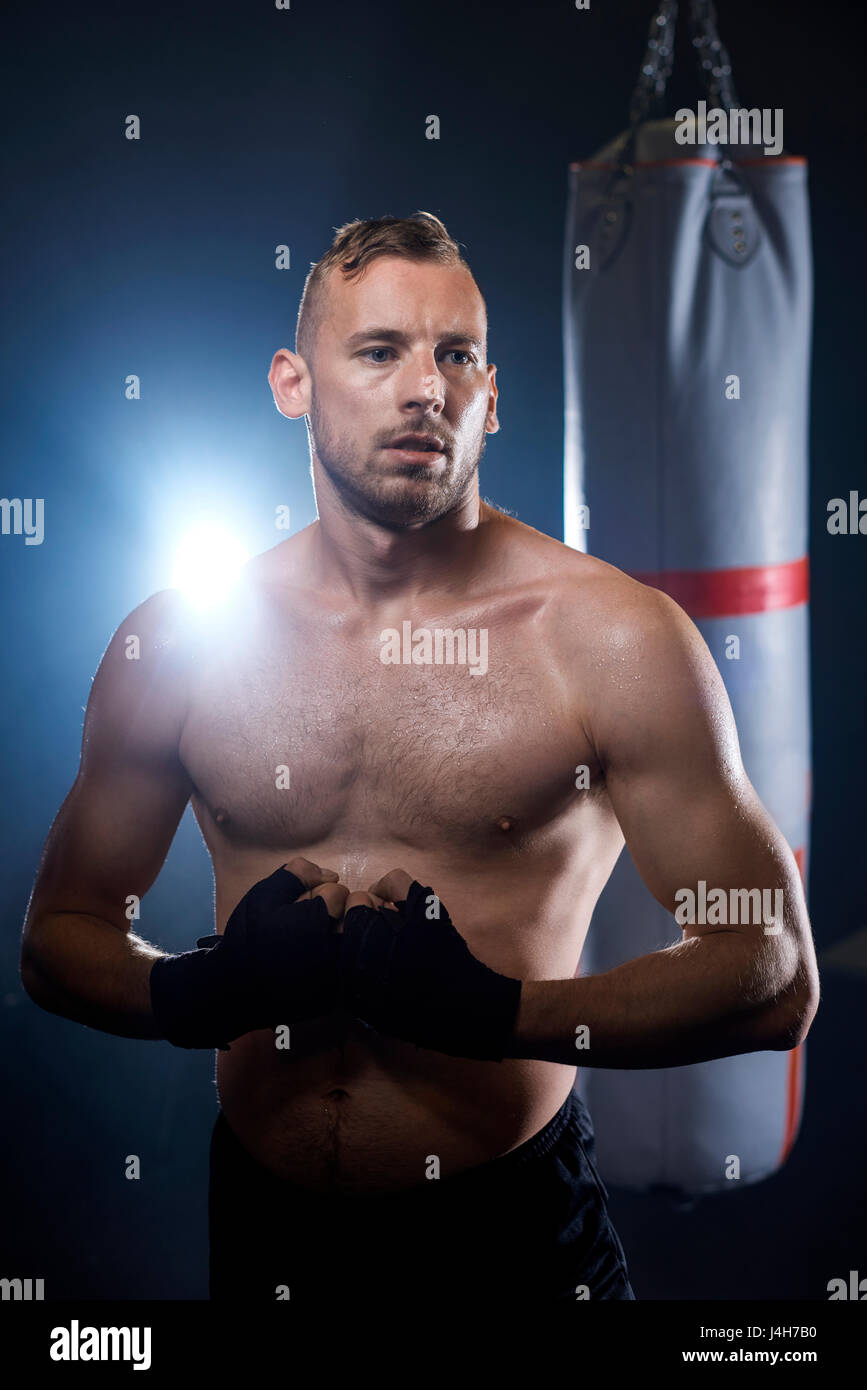 Waist up of muscular male boxer Stock Photo - Alamy