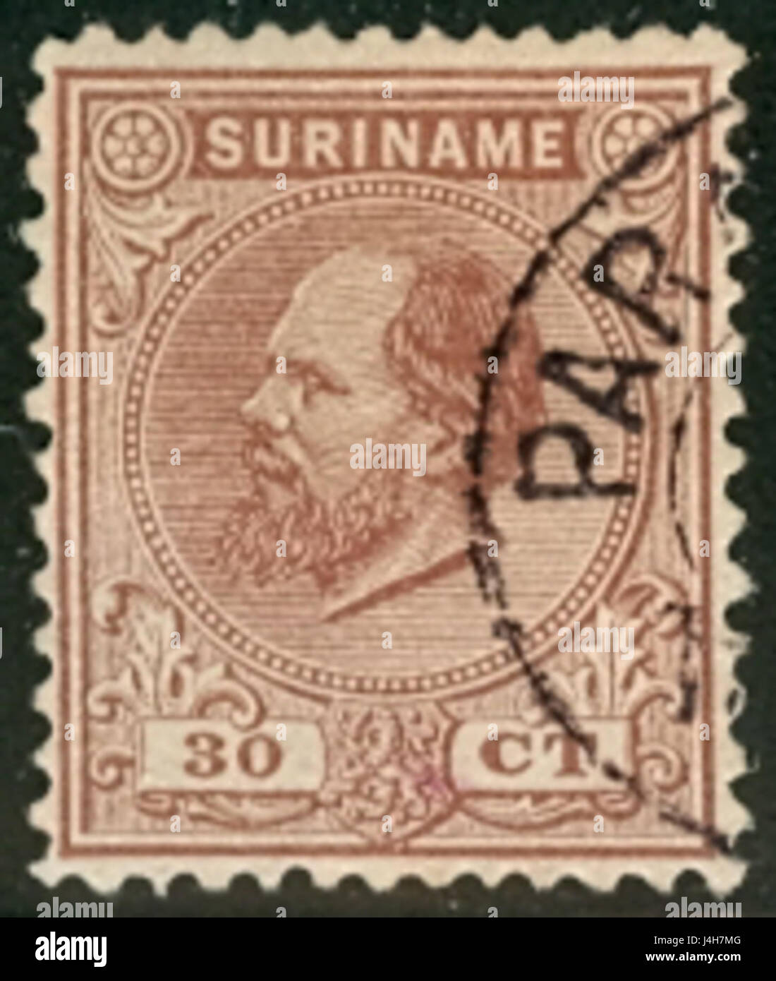 A stamp from Suriname, showcasing the countryâ€™s postal system ...
