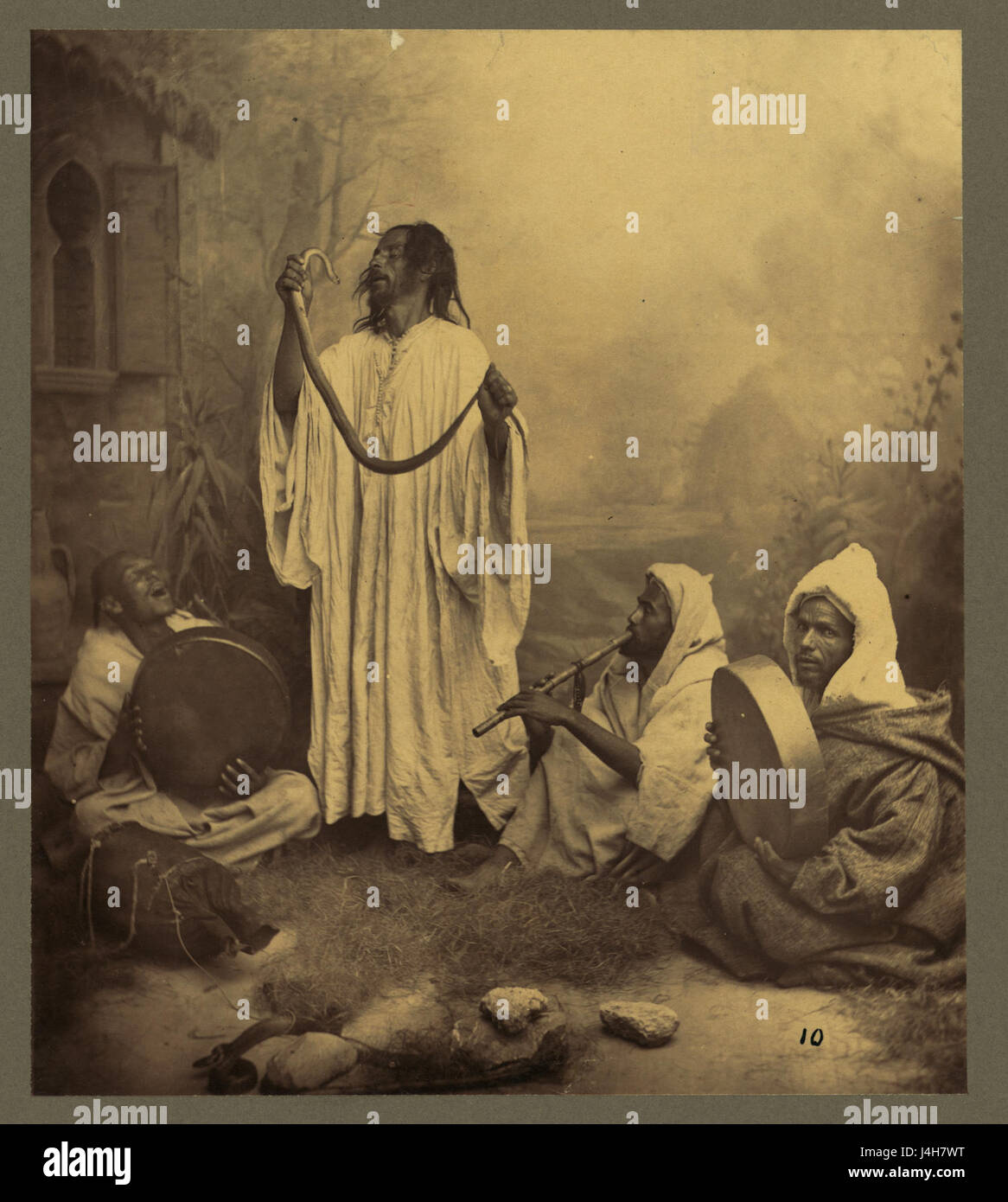 Snake charmers are traditional performers who entertain by coaxing ...