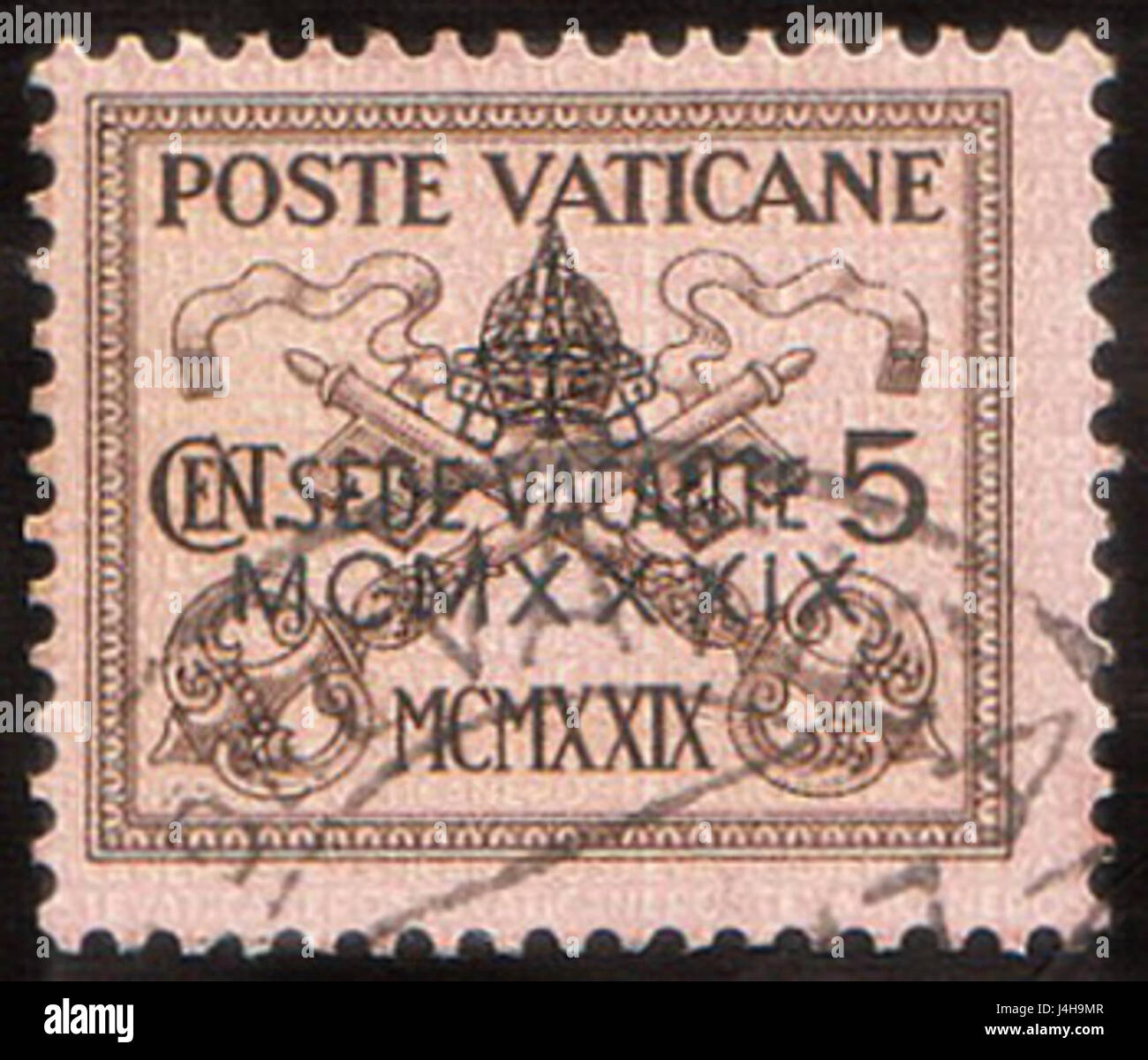 This stamp, issued by the Vatican in 1939, showcases the intricate ...