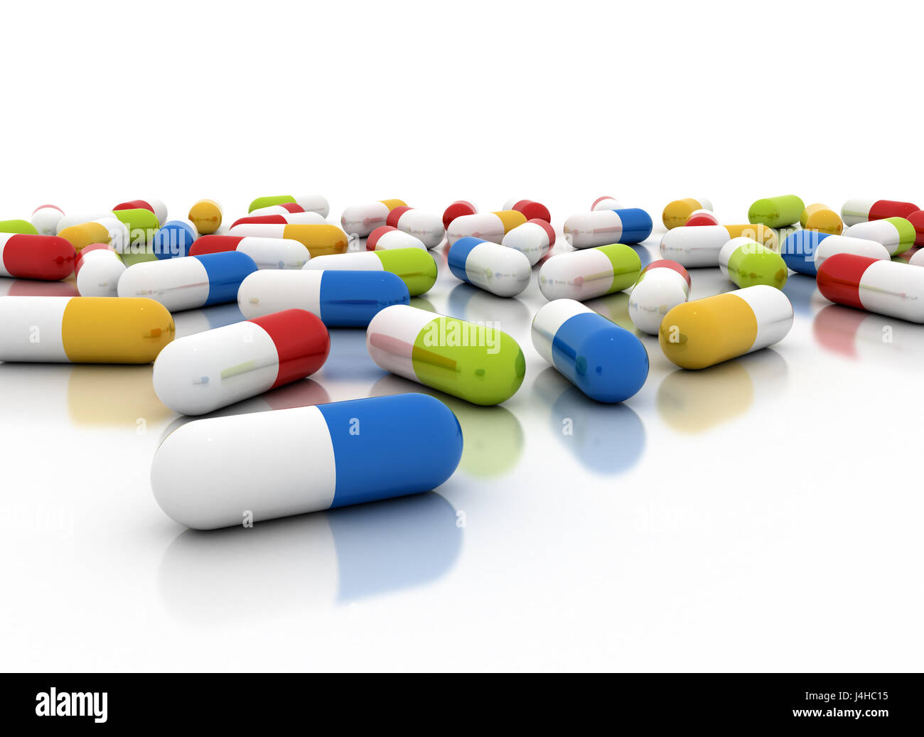 Multi color pills on white background Stock Photo - Alamy