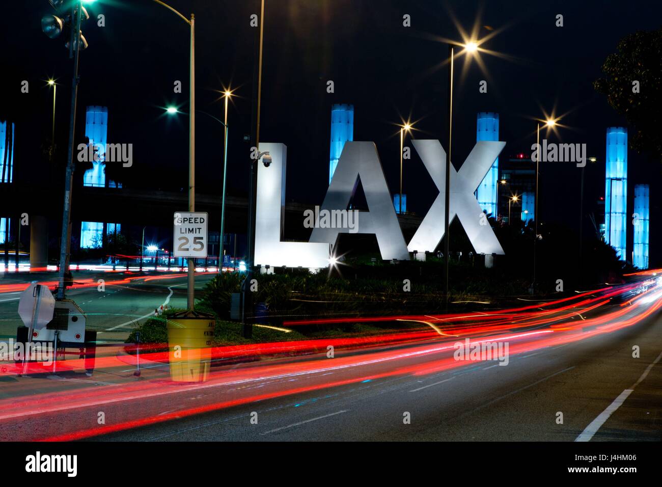 Longish automobile light trails of the traffic at the iconic sign of ...