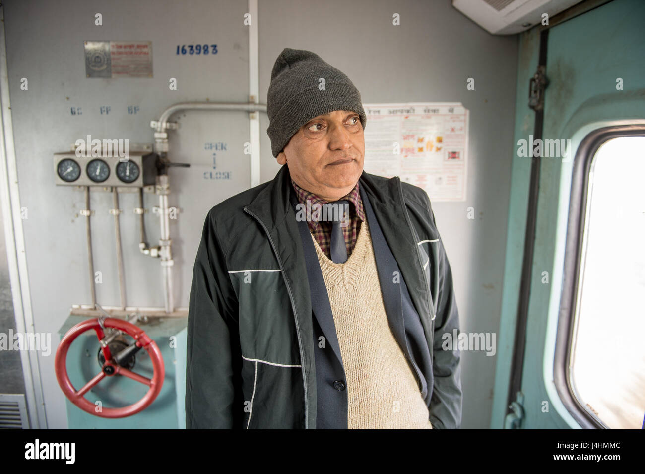 A man on a train in Ludhiana, India Stock Photo - Alamy