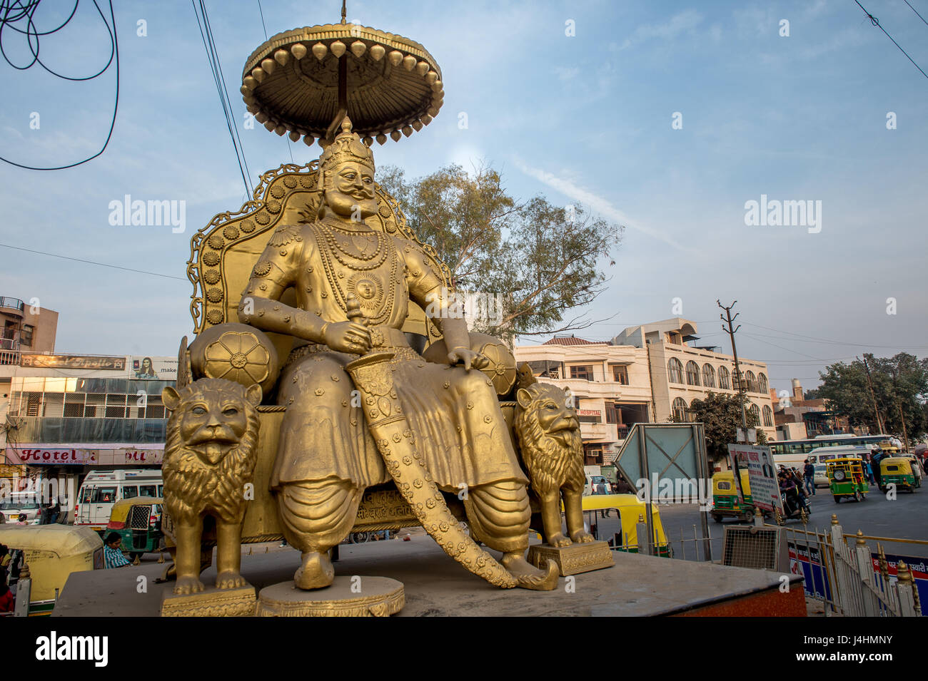 A gold statue of an Indian god is proudly displayed in downtown Agra ...