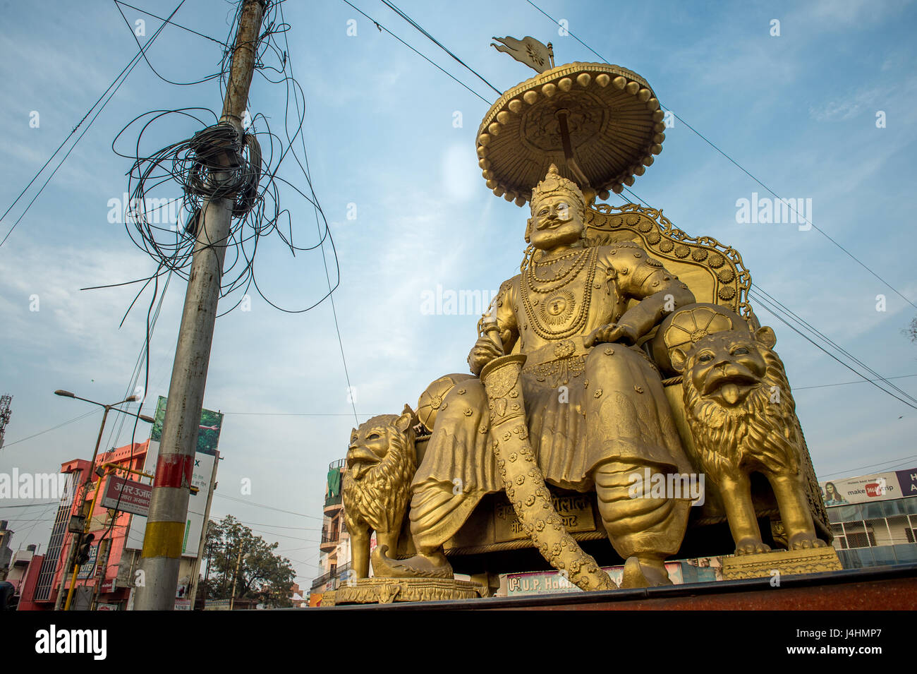 A gold statue of an Indian god is proudly displayed in downtown Agra ...
