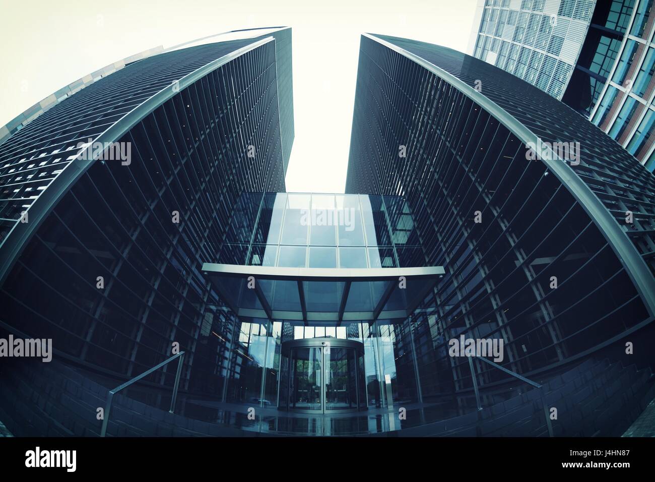 Financial skyscraper entrance from below. Empty copy space for Editor's ...