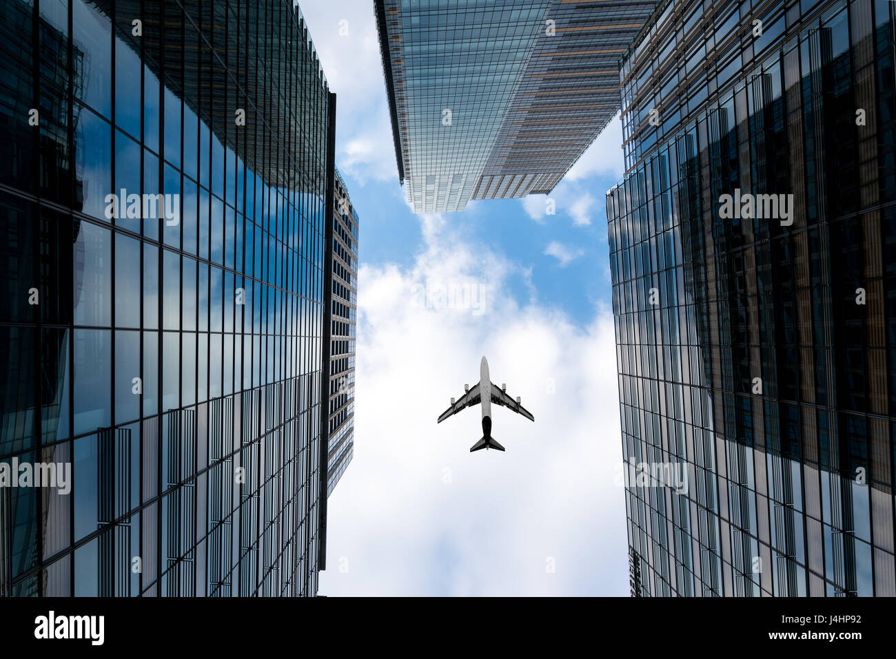 Plane over building hi-res stock photography and images - Alamy