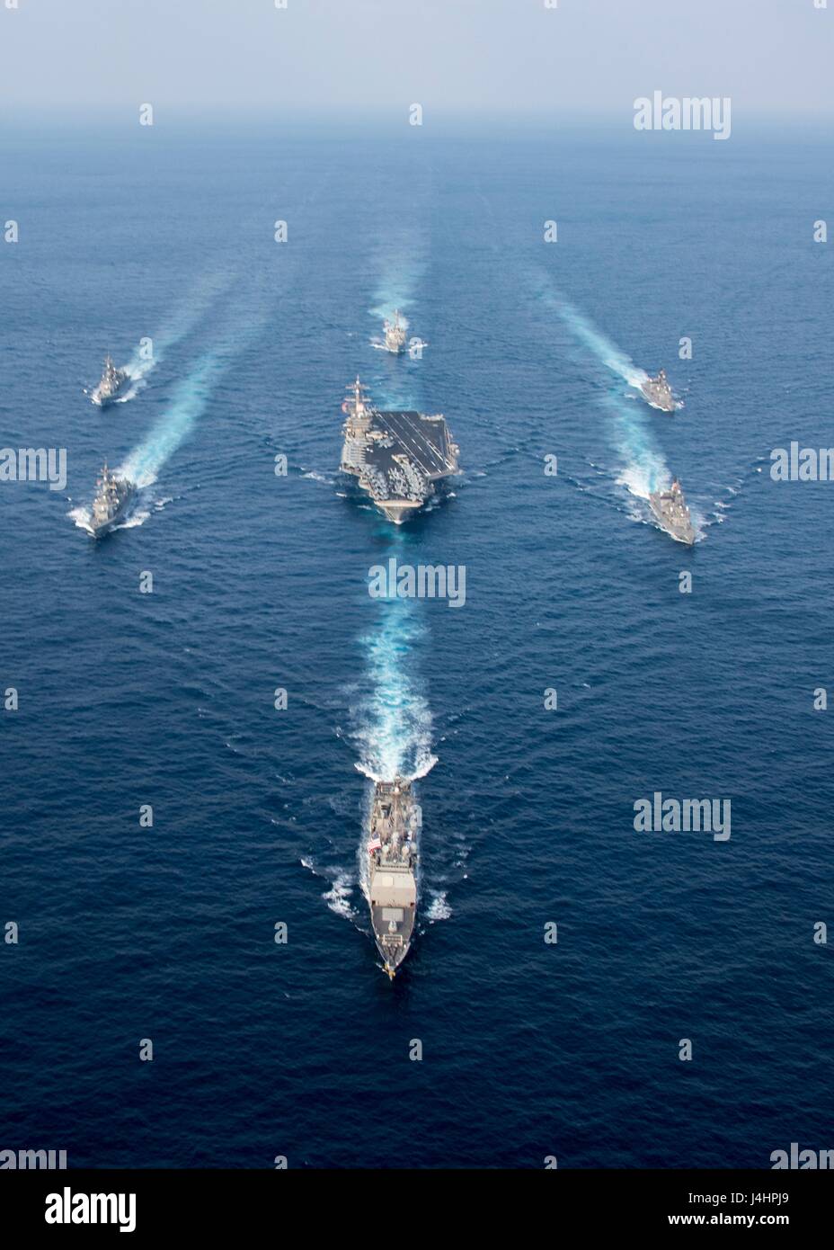The USN Ticonderoga-class guided-missile cruiser USS Lake Champlain ...