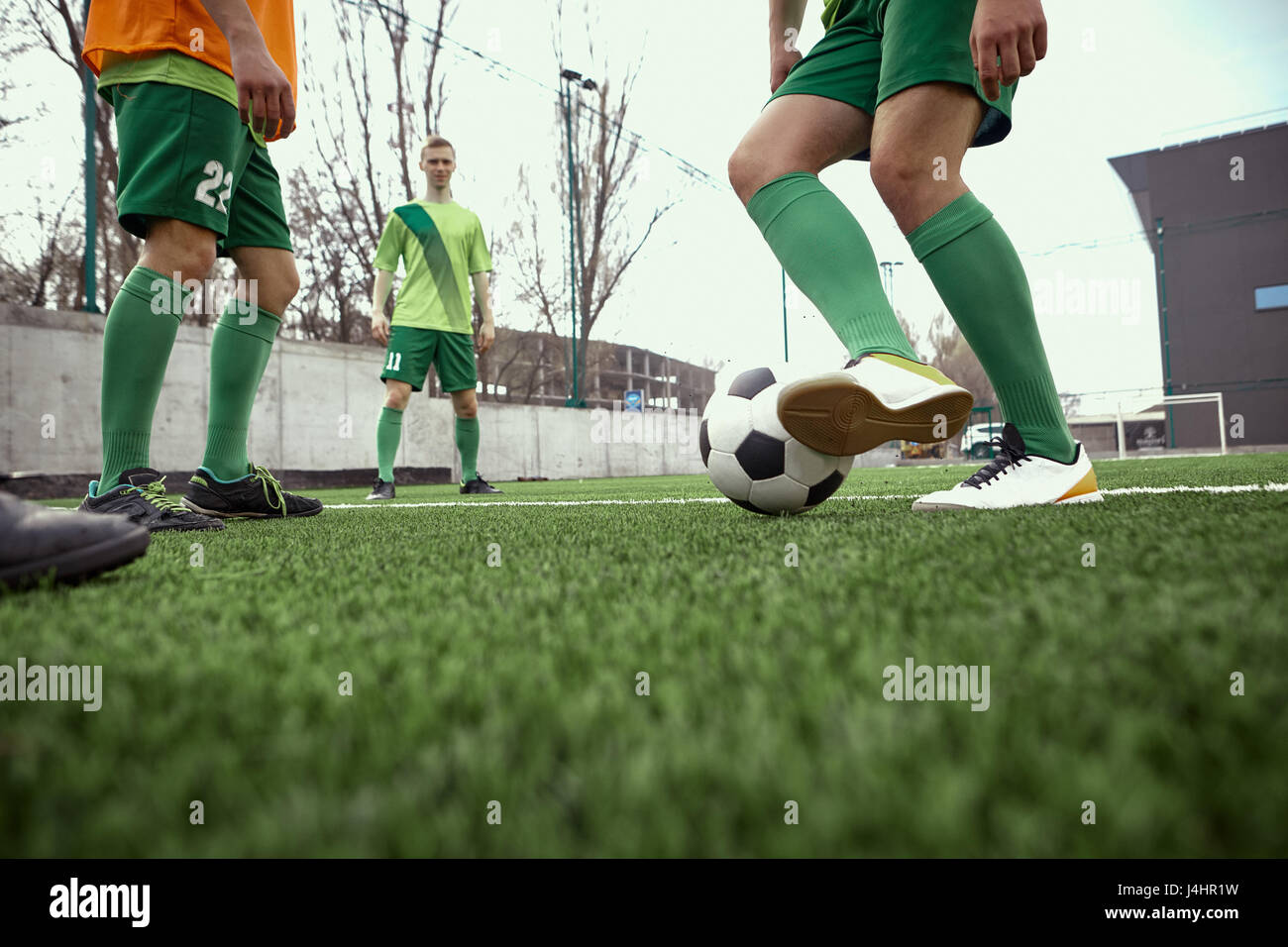 Playing football match ball hi-res stock photography and images - Alamy